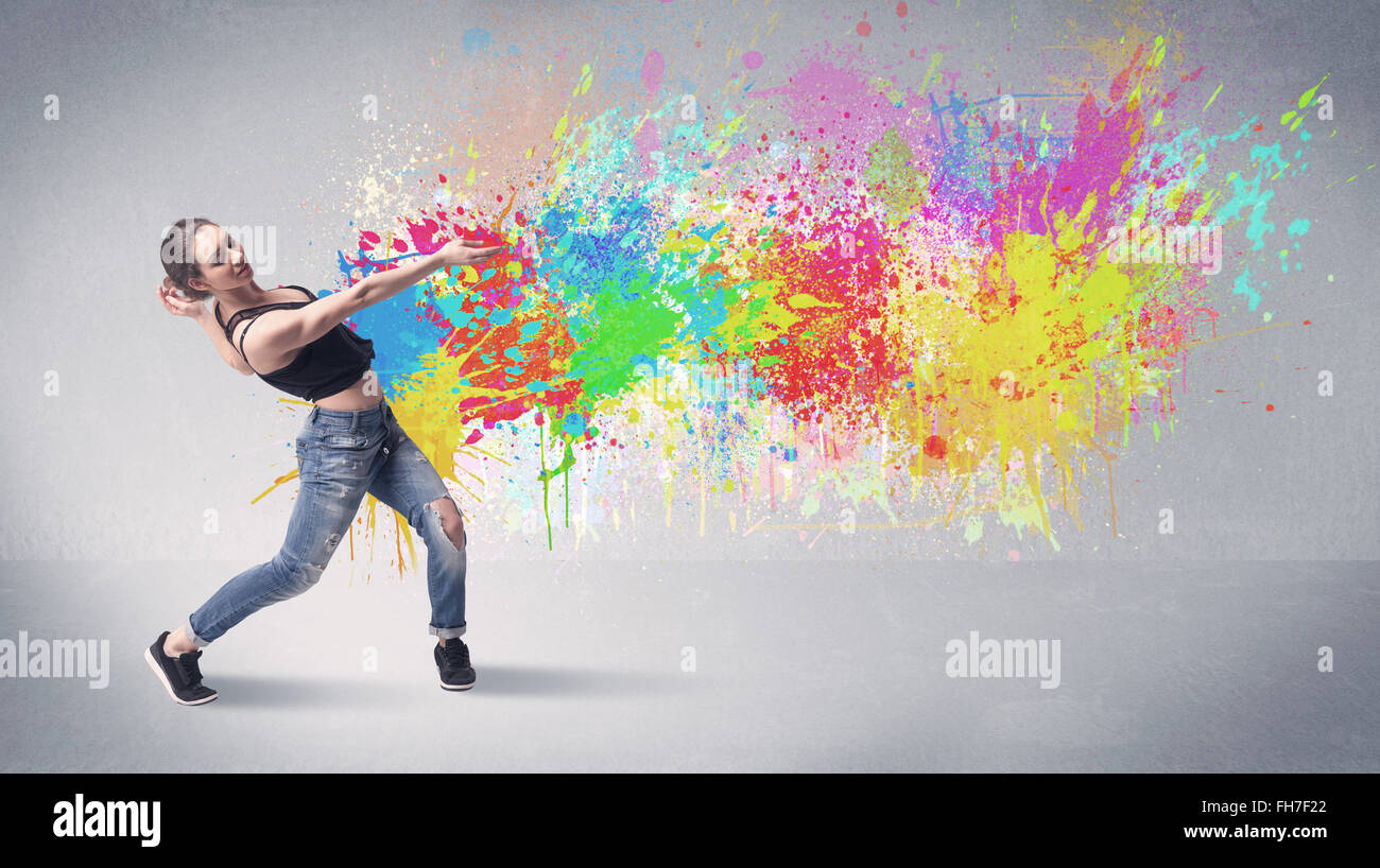 Young colorful street dancer with paint splash Stock Photo - Alamy