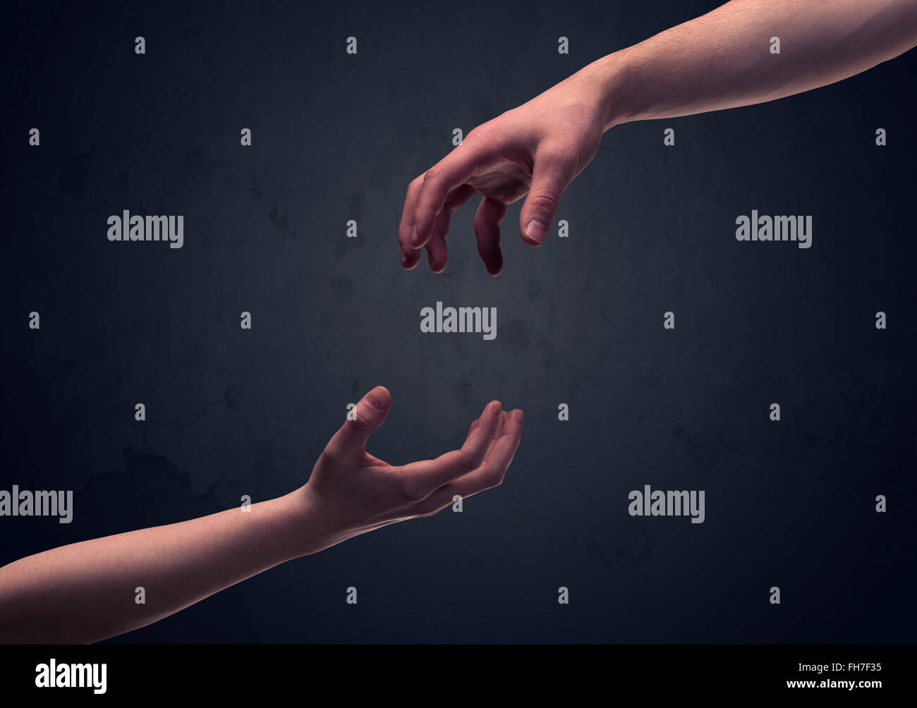 Hand about to touch another one Stock Photo - Alamy