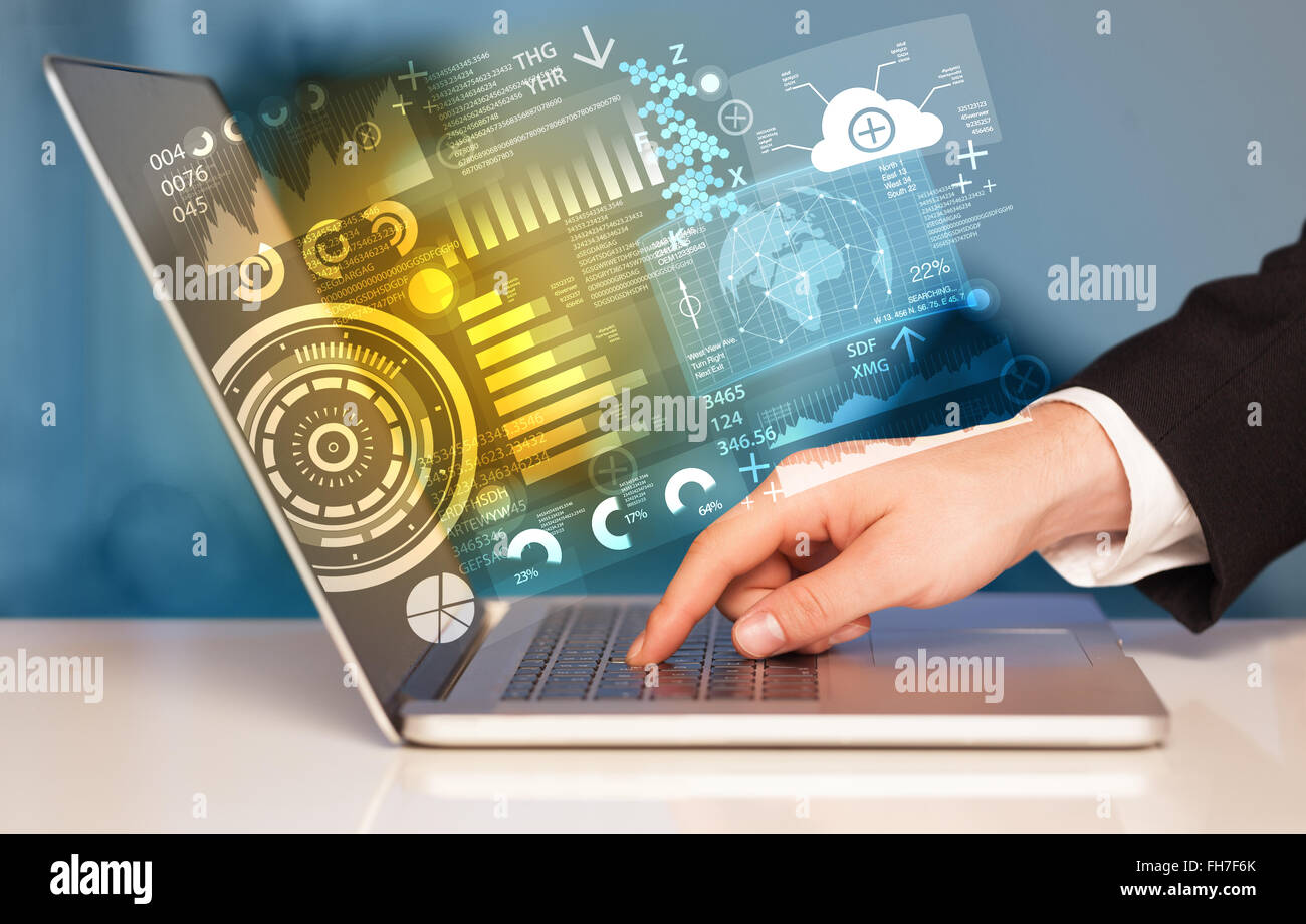 Modern notebook computer with future technology symbols Stock Photo - Alamy