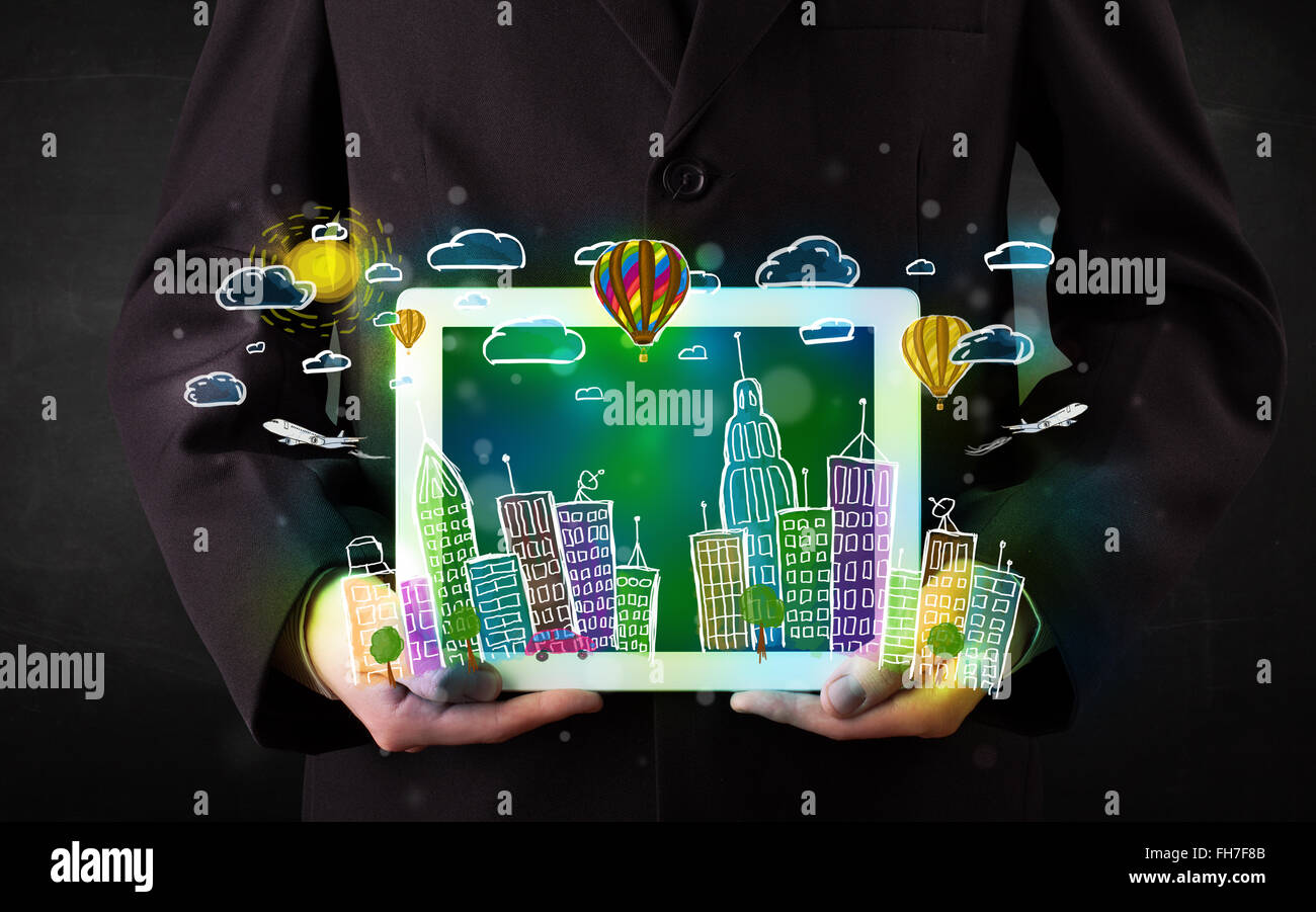 Young person showing tablet with hand drawn cityscape Stock Photo - Alamy
