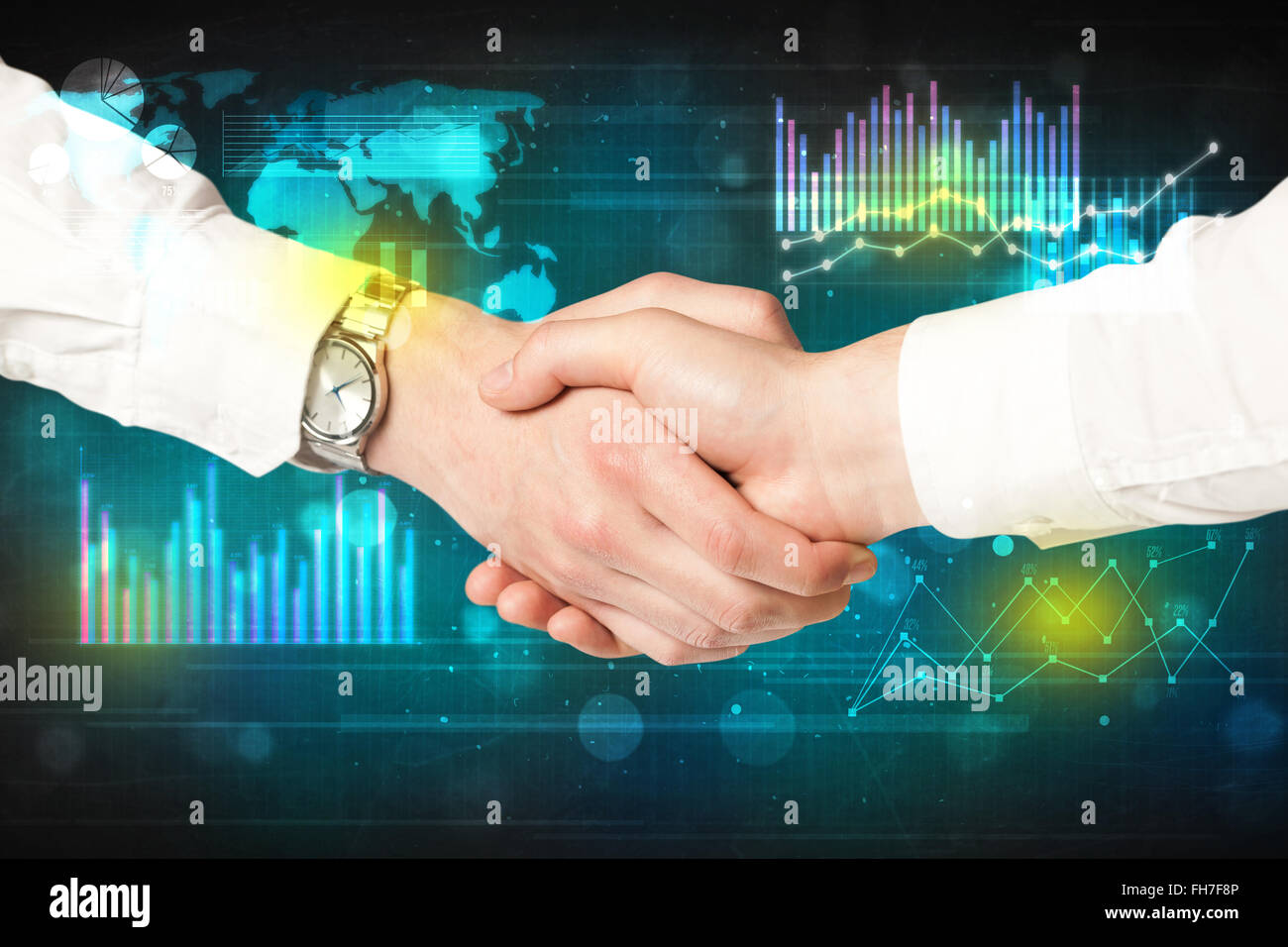 Handshake with diagrams Stock Photo - Alamy
