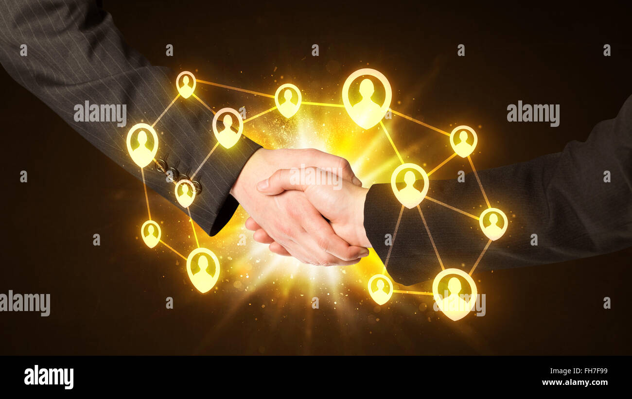 Social netwok connection handshake Stock Photo - Alamy
