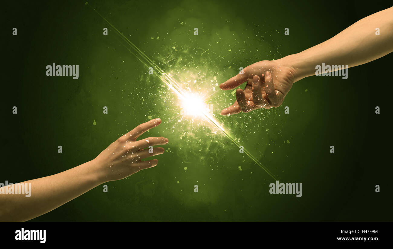 Touching arms lighting spark at fingertip Stock Photo - Alamy