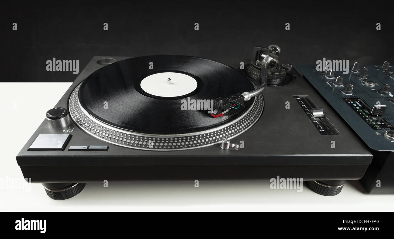 Turntable playing vinyl close up with needle on the record Stock Photo ...