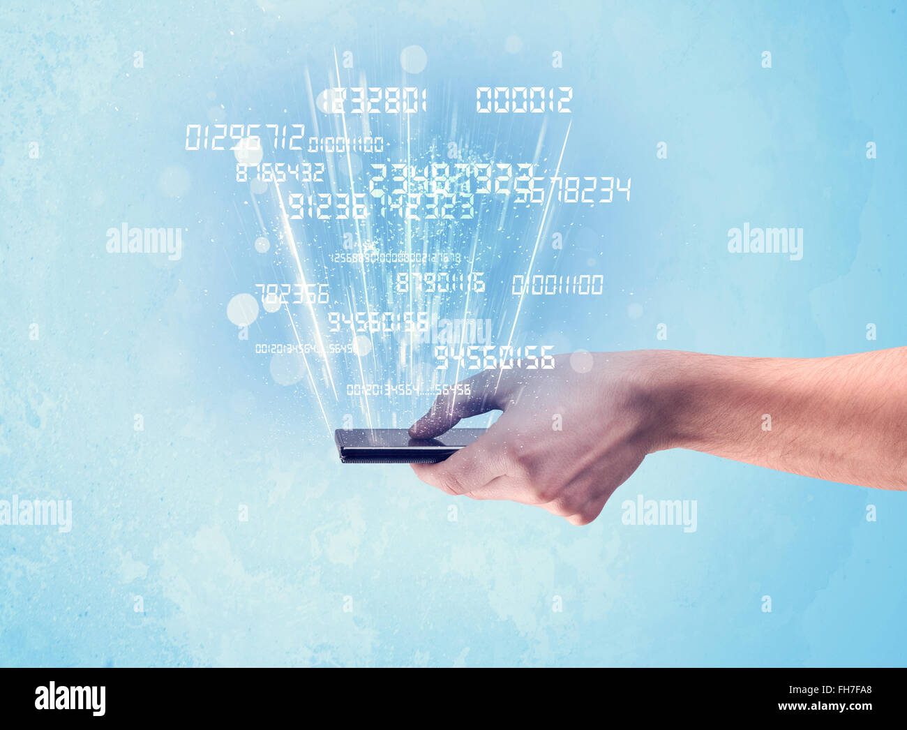 Hand holding phone with digital numbers Stock Photo - Alamy