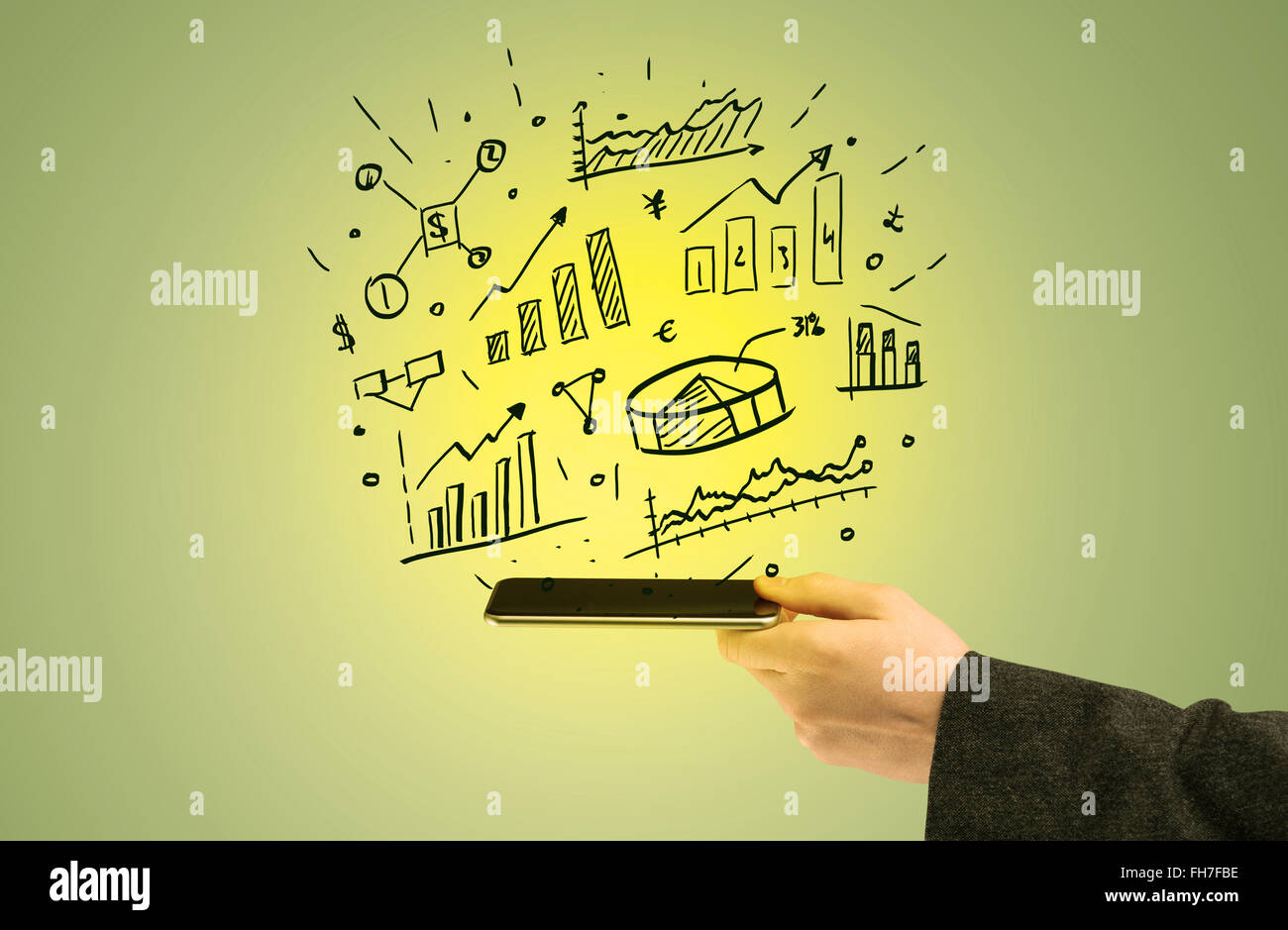 Sales charts on top of mobile phone in hand Stock Photo - Alamy