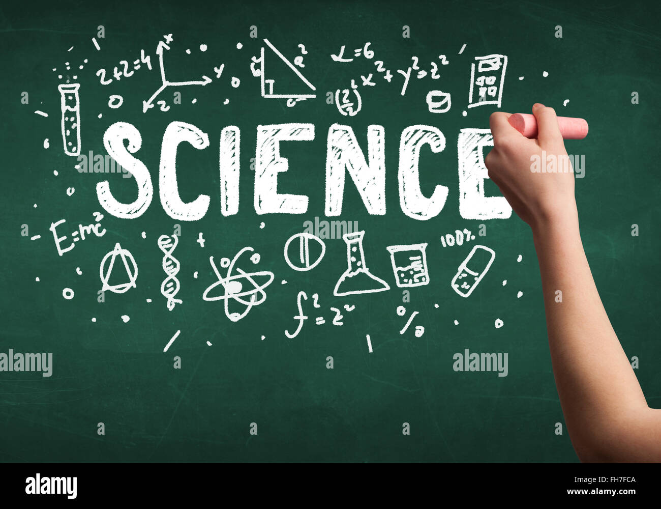 Mature science person drawing on board Stock Photo - Alamy