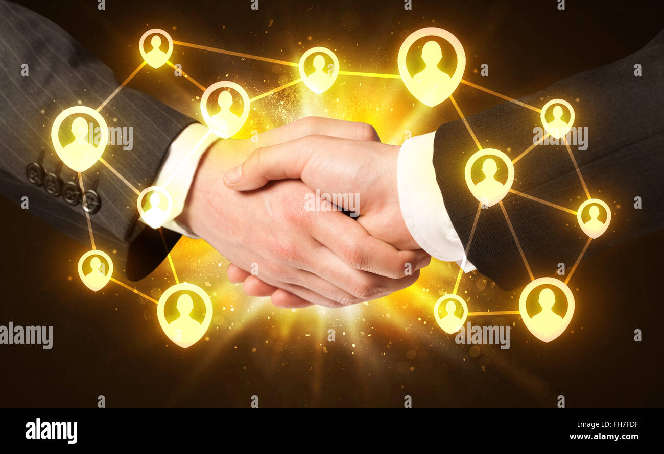 Social netwok connection handshake Stock Photo - Alamy