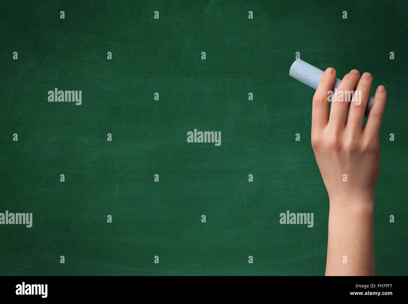 Hand writing on clean blackboard Stock Photo - Alamy