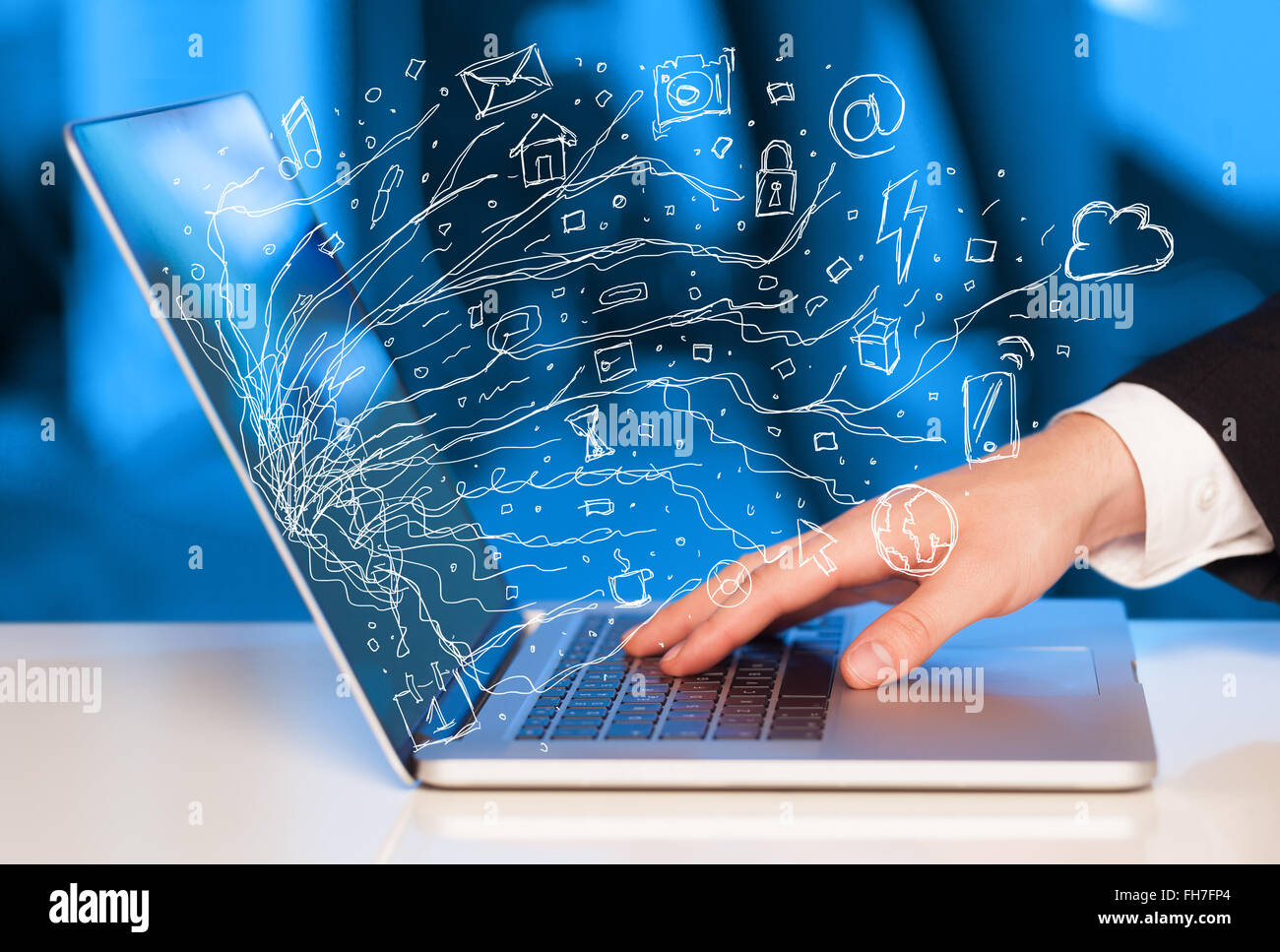 Man pressing notebook laptop computer with doodle icon cloud symbols ...