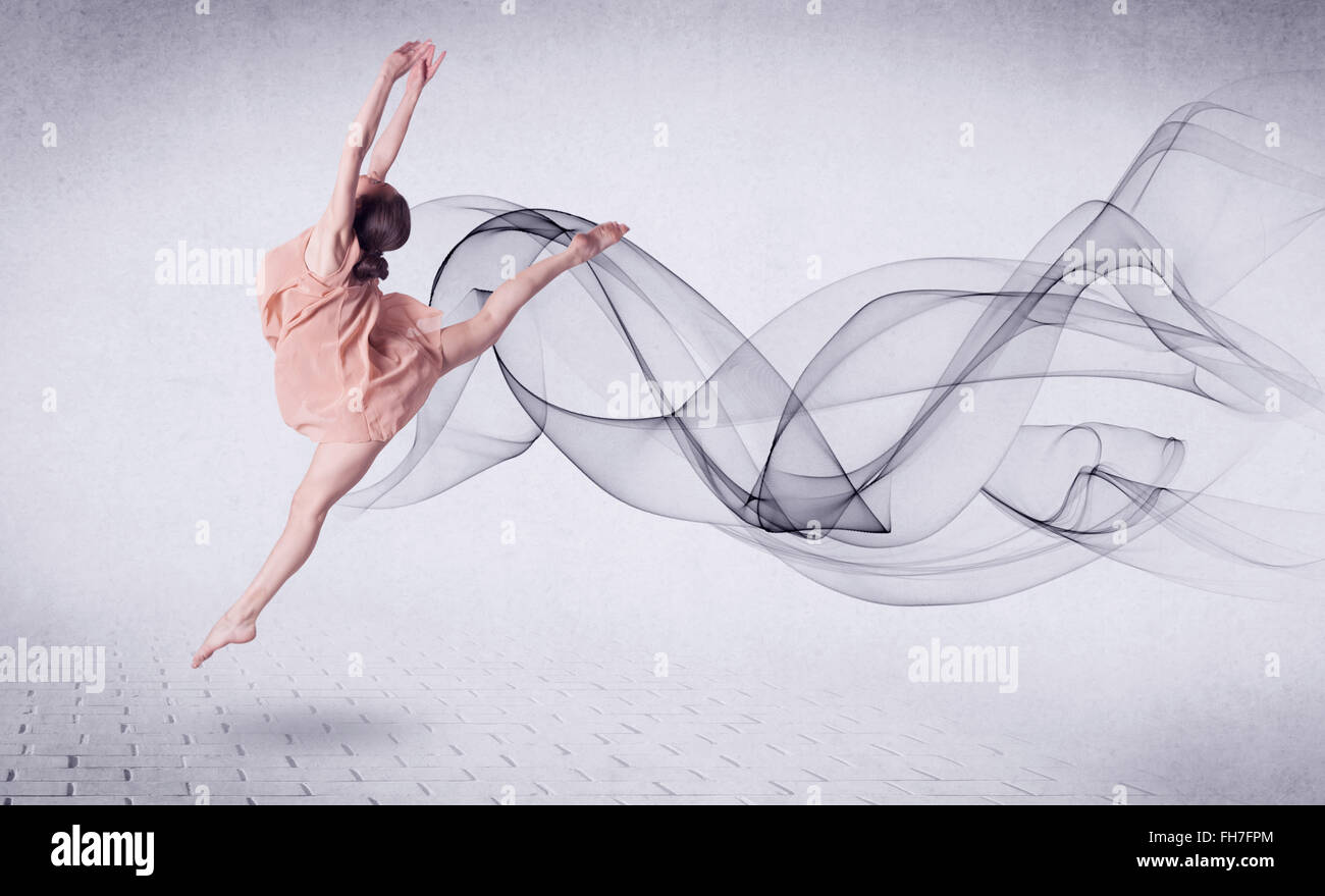 Modern ballet dancer performing with abstract swirl Stock Photo - Alamy