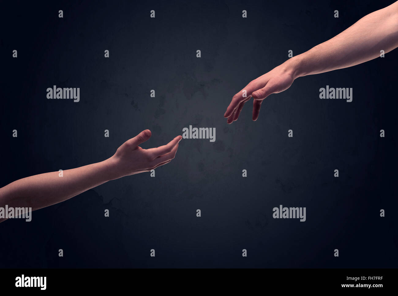 Hand about to touch another one Stock Photo - Alamy