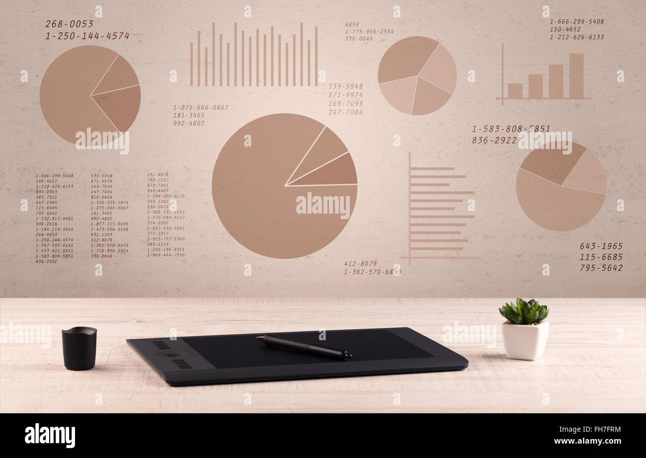 Pie chart graph office desk Stock Photo - Alamy