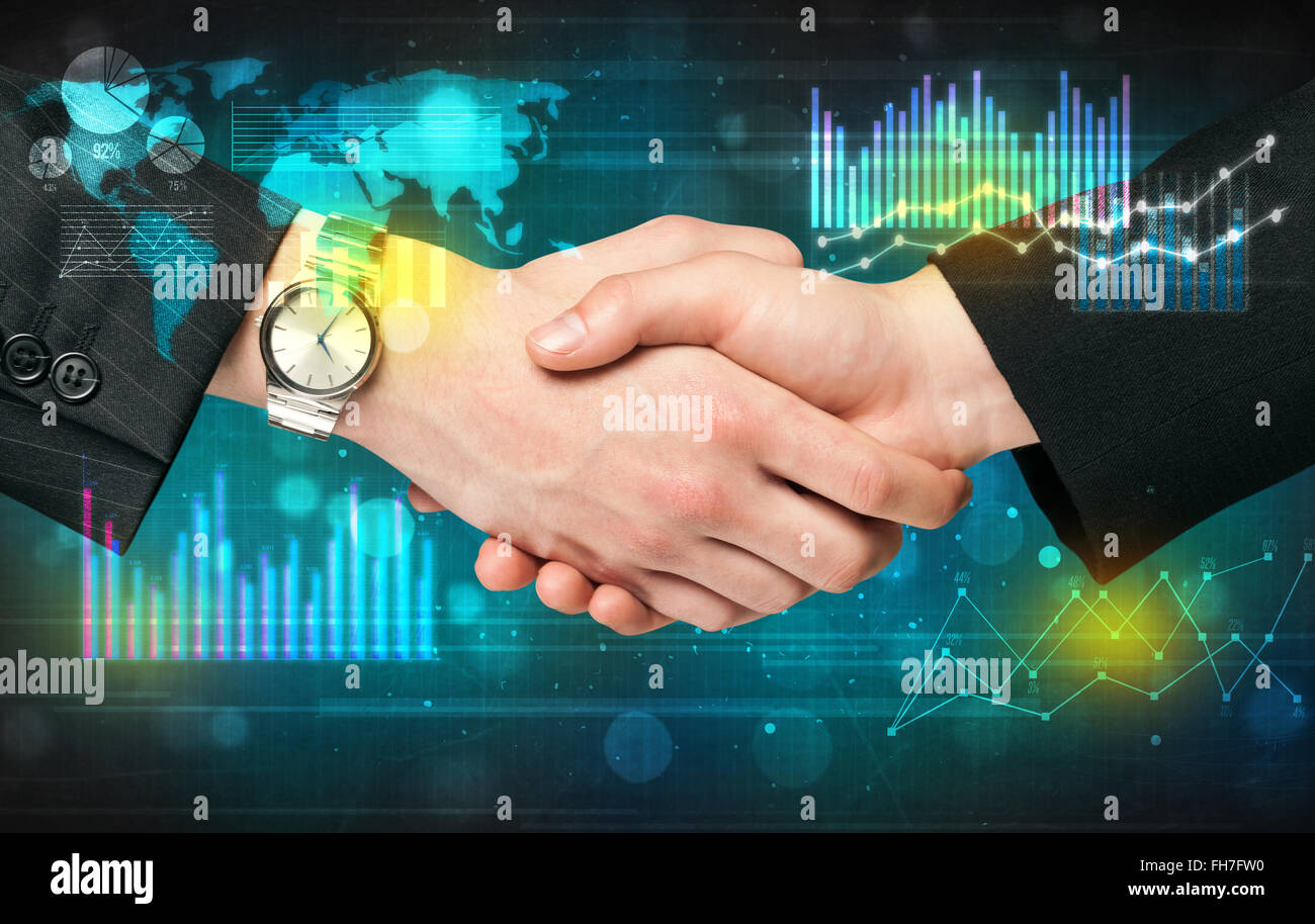 Handshake with diagrams Stock Photo - Alamy