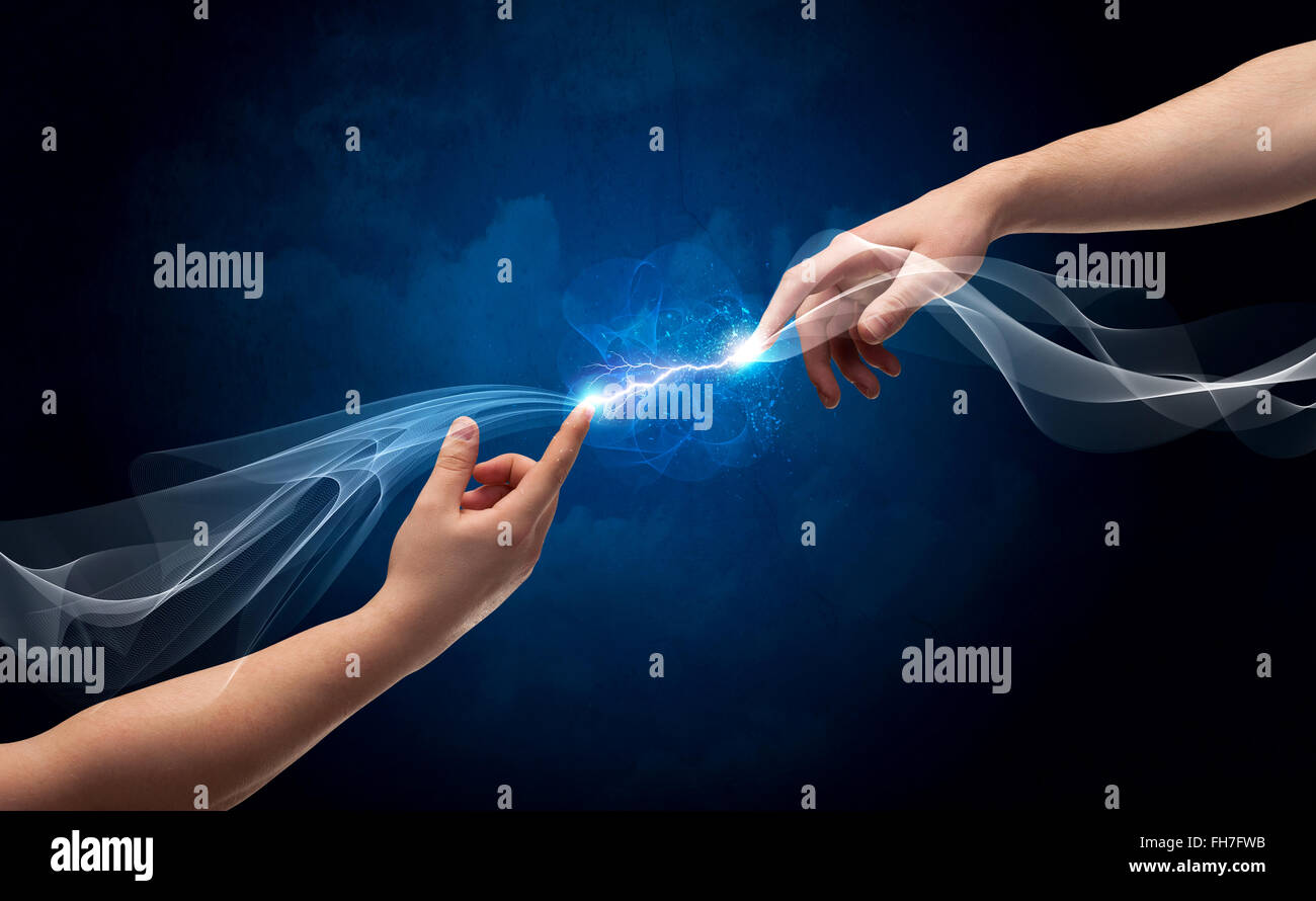Hands connecting through fingers in space Stock Photo - Alamy