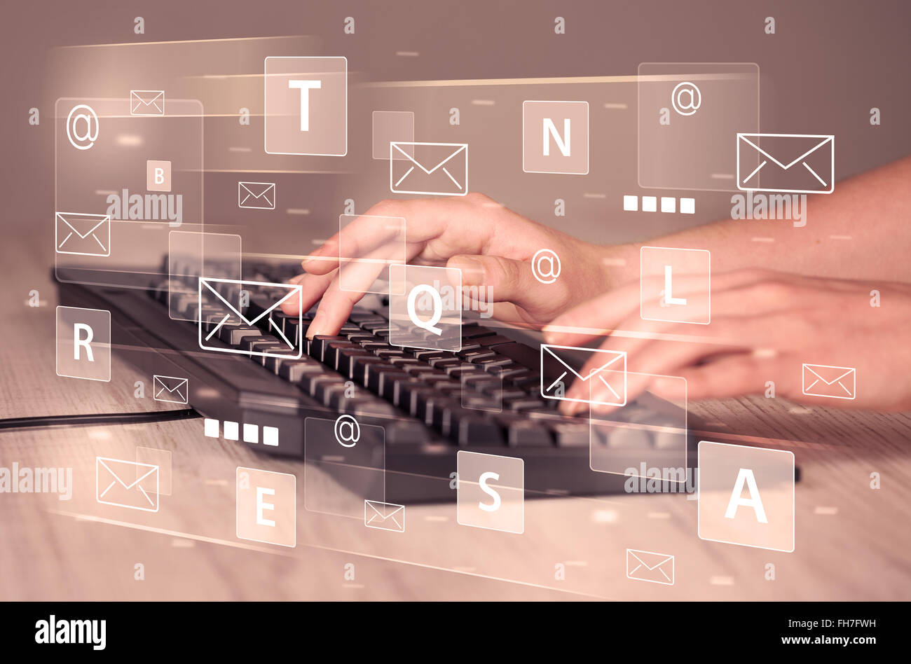Hand typing on keyboard with digital tech icons Stock Photo - Alamy