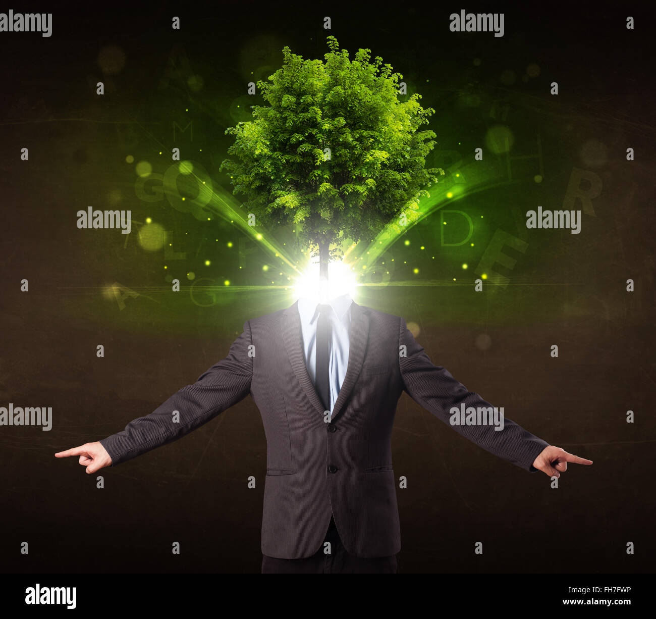 Man with green tree head concept Stock Photo - Alamy