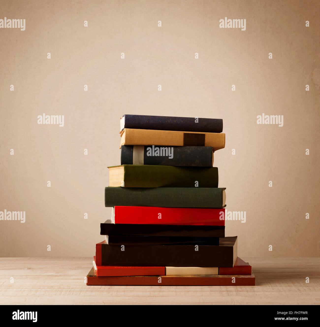 A stack of books with vintage background Stock Photo - Alamy