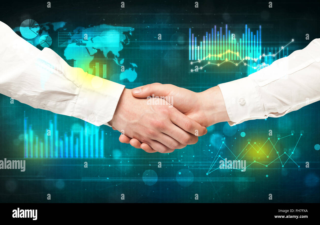 Handshake with diagrams Stock Photo - Alamy