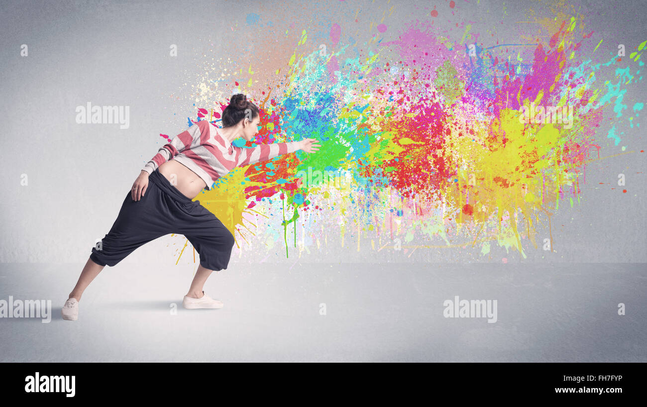 Young colorful street dancer with paint splash Stock Photo - Alamy
