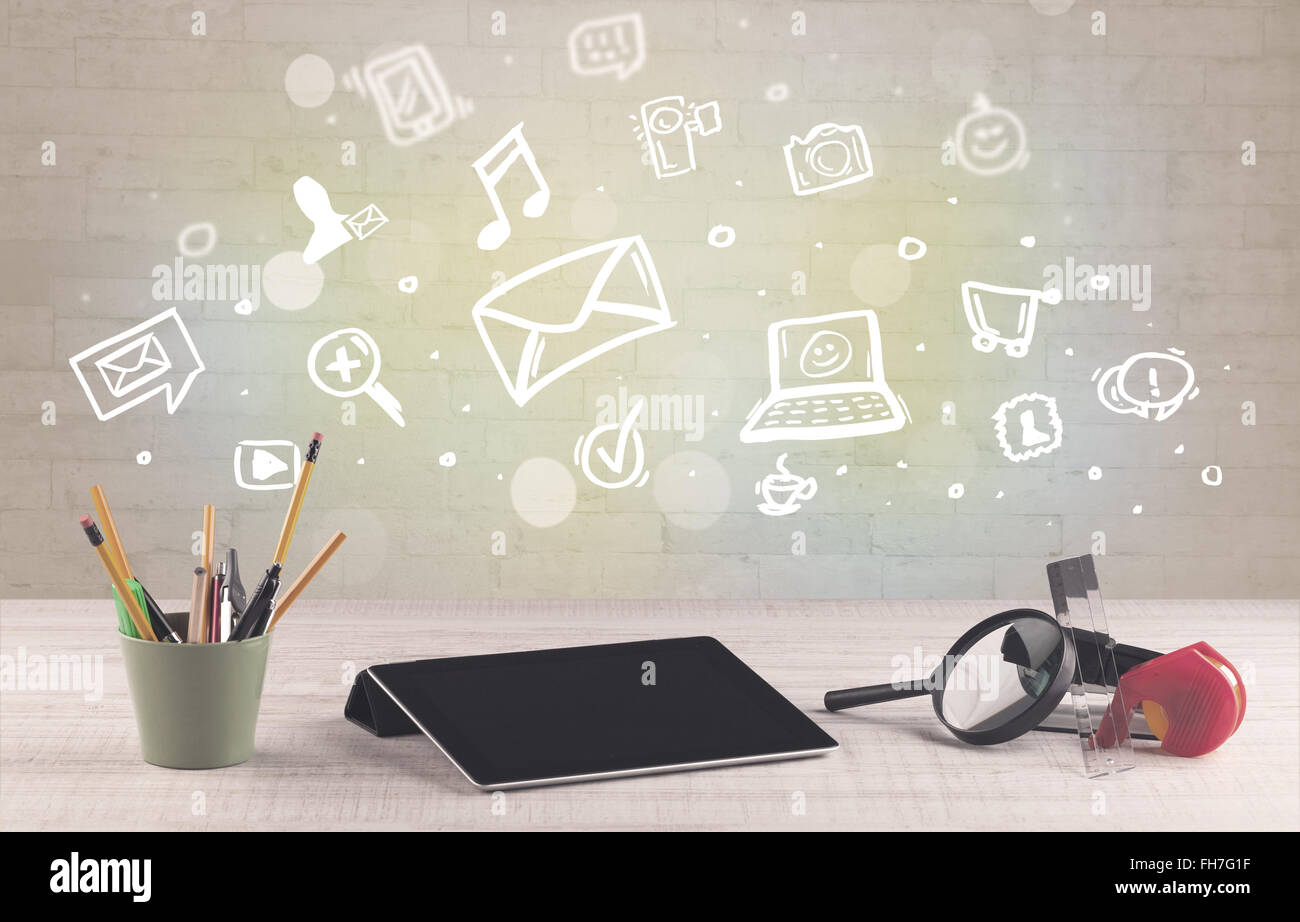 Office desk with communication icons Stock Photo - Alamy