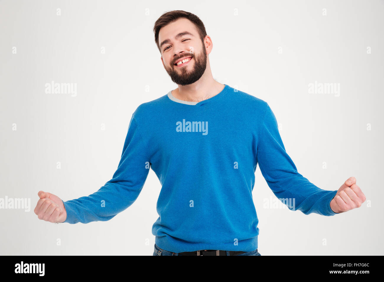 Successful casual man standing isolated on a white background Stock ...