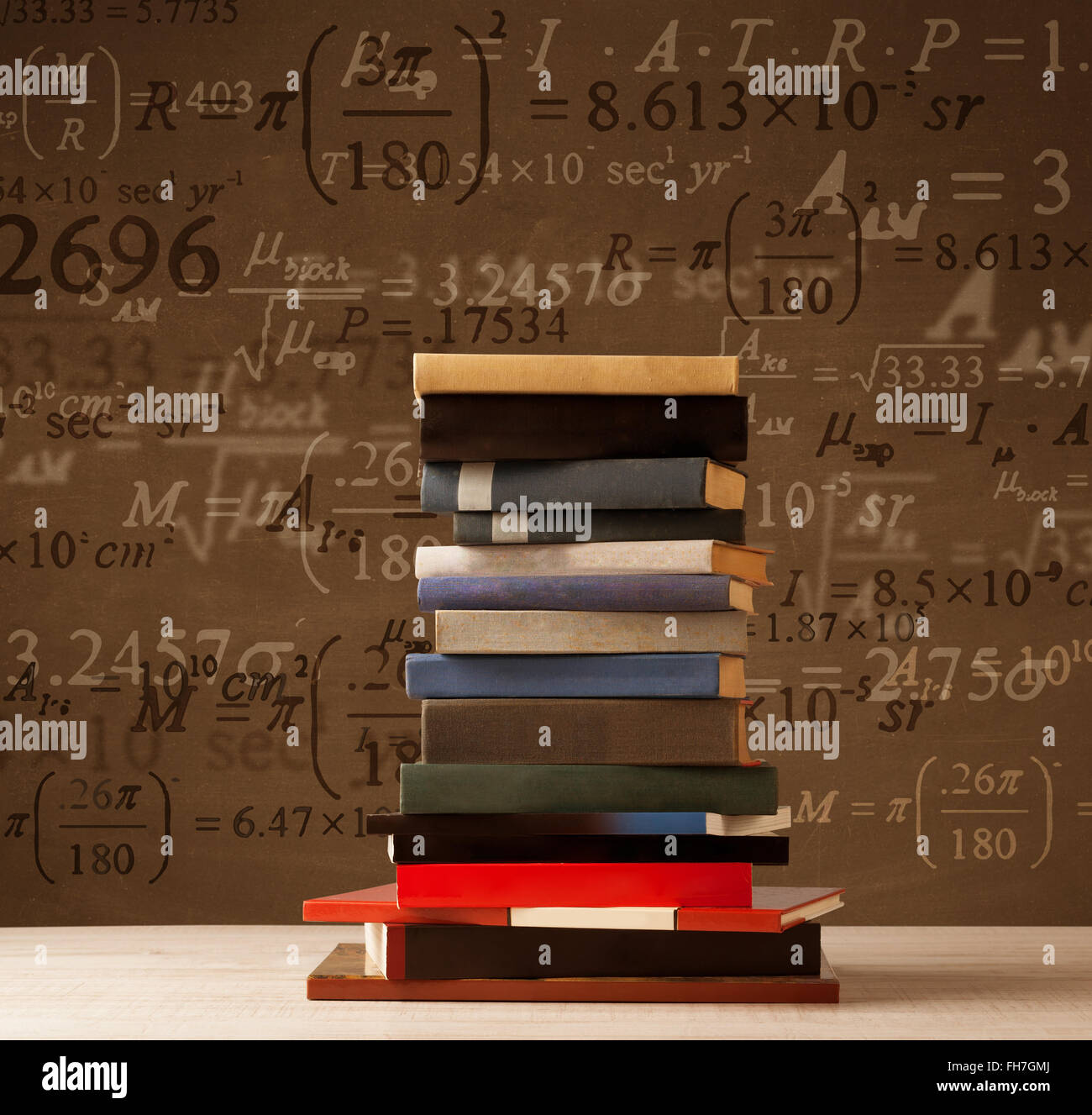 Books on vintage background with math formulas Stock Photo - Alamy