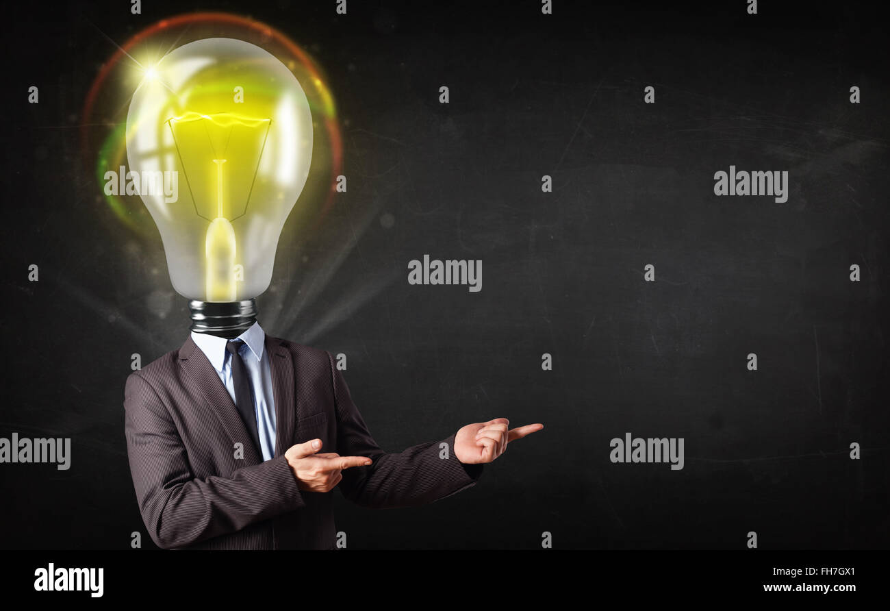 Business man with light bulb head concept Stock Photo - Alamy