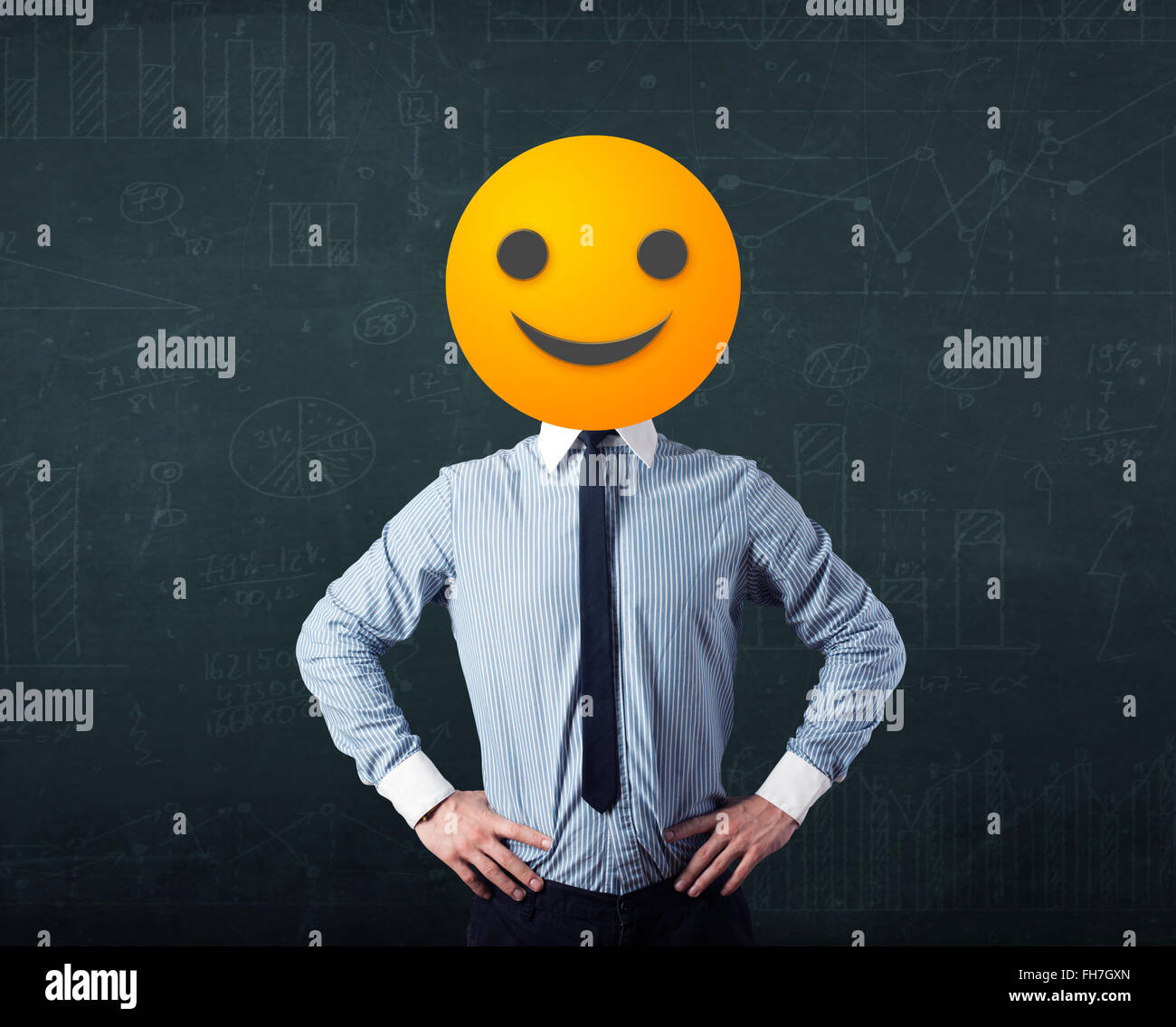 businessman wears yellow smiley face Stock Photo - Alamy