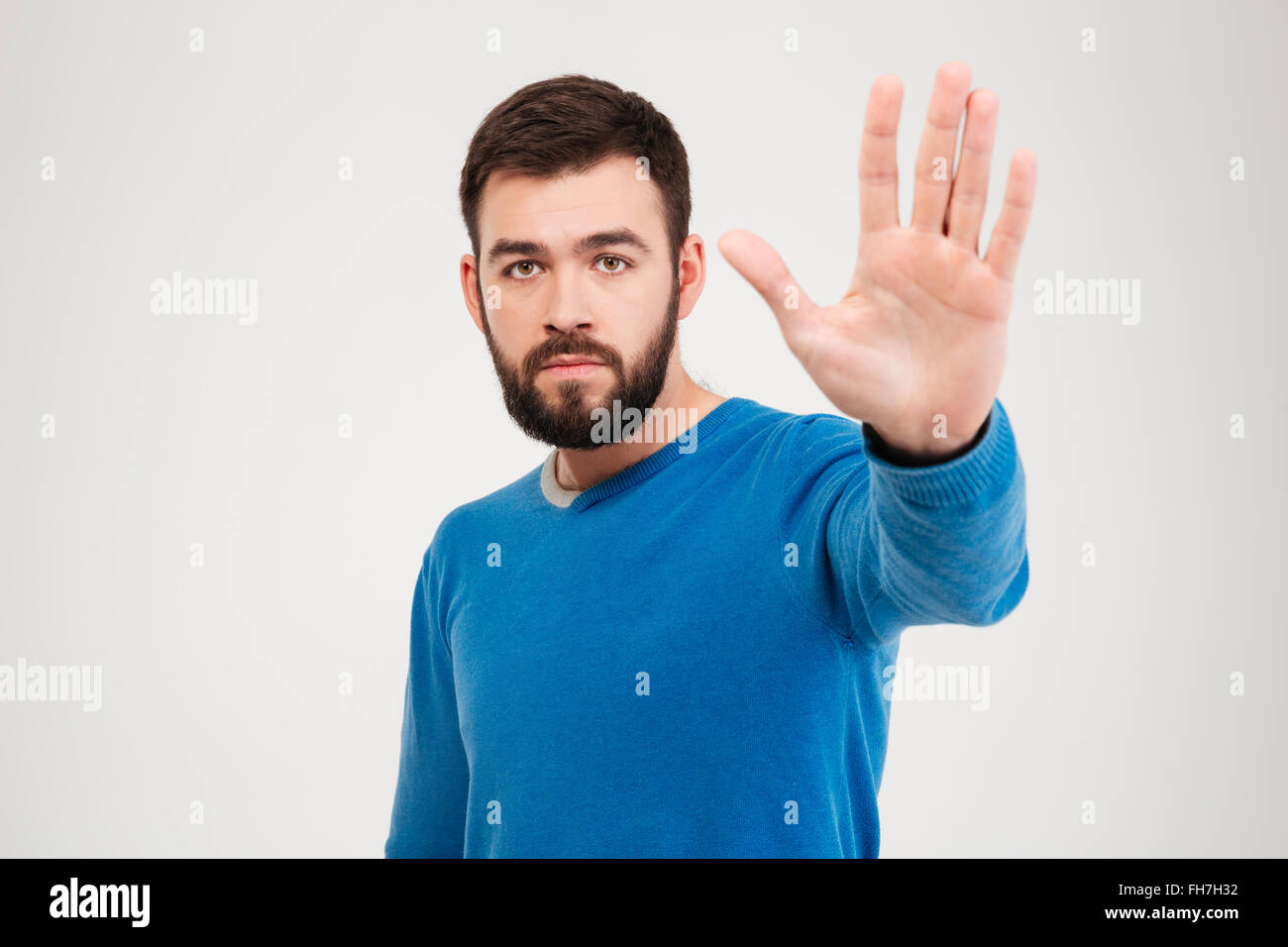Man showing stop sign with palm isolated on a white background Stock ...