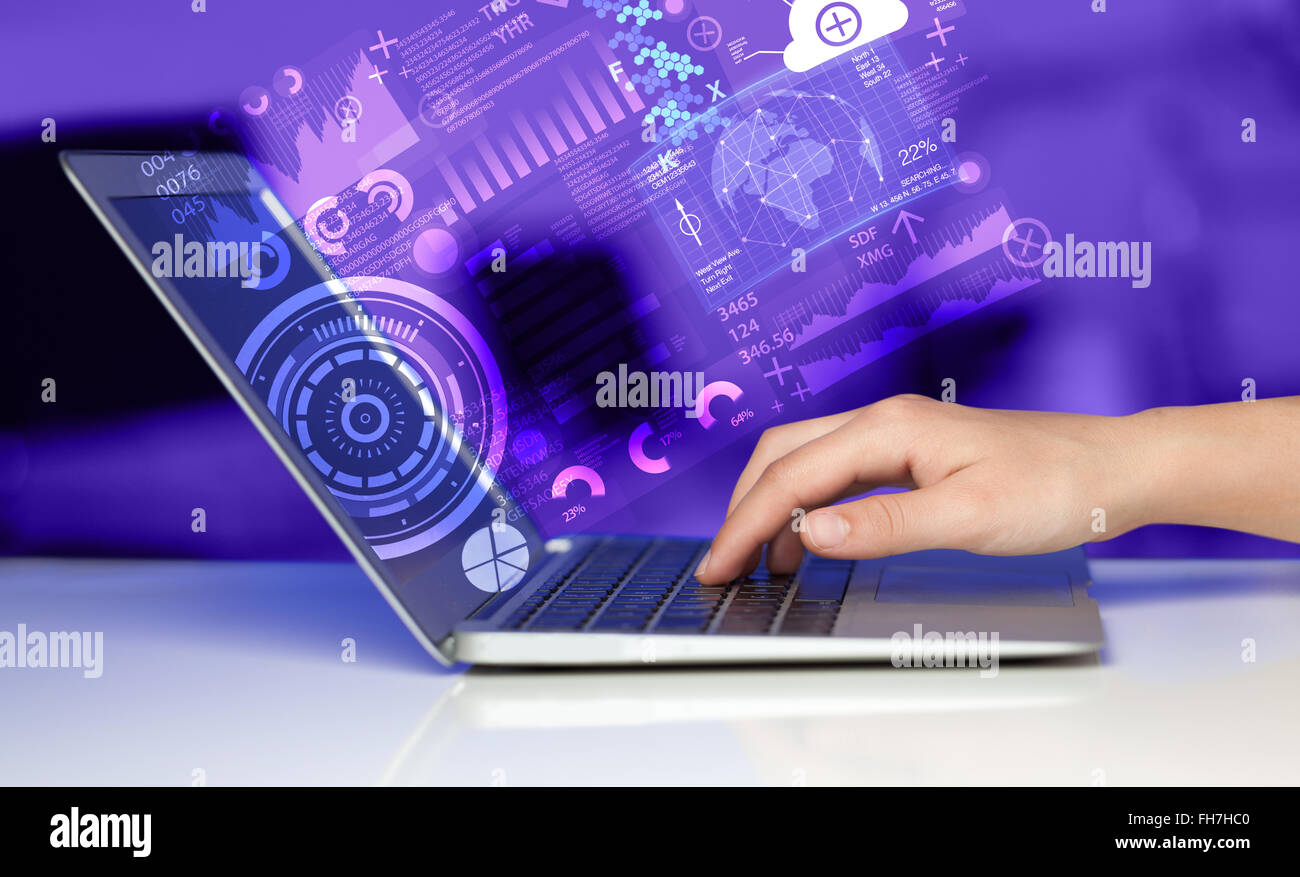 Modern notebook computer with future technology symbols Stock Photo - Alamy