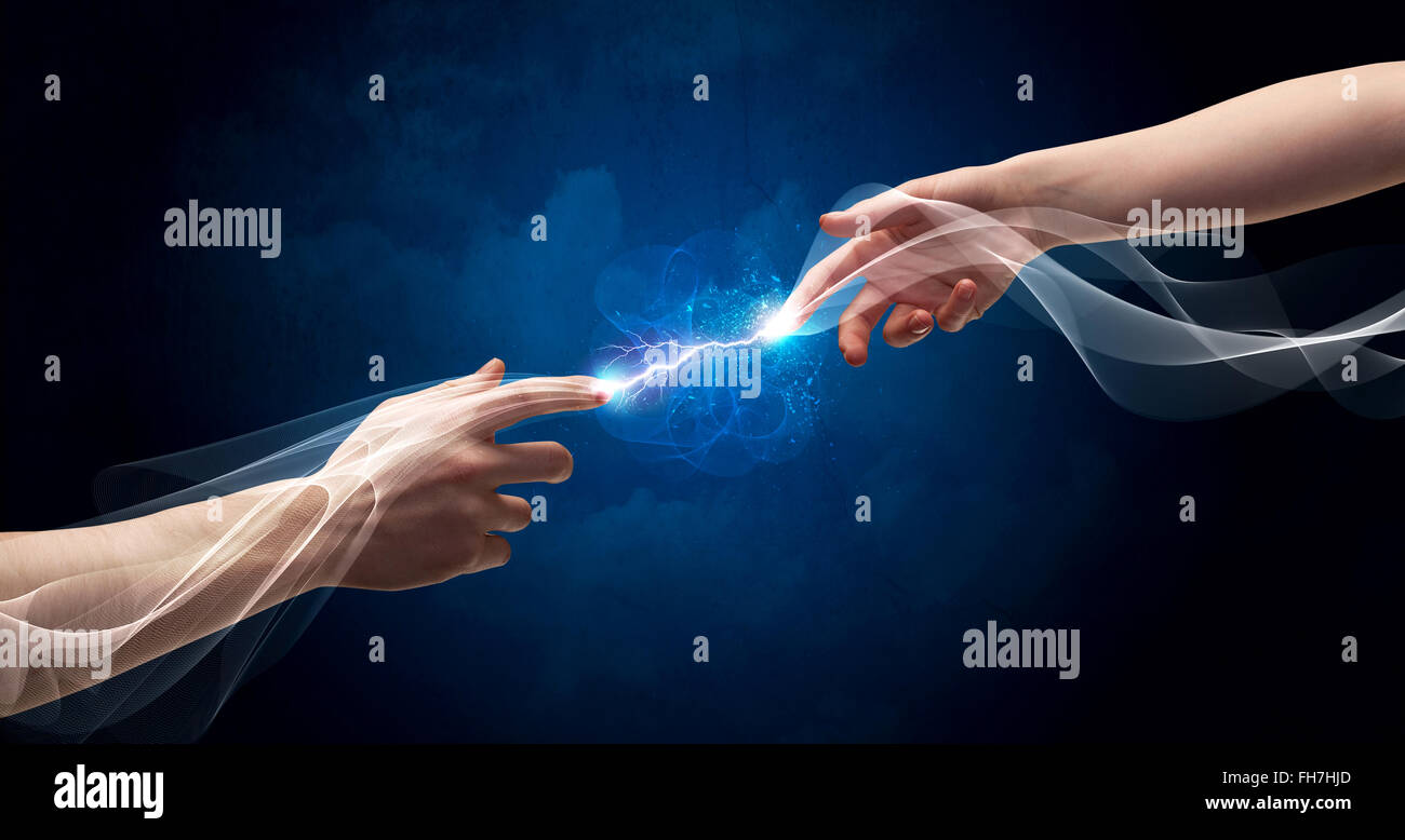 Hands connecting through fingers in space Stock Photo - Alamy
