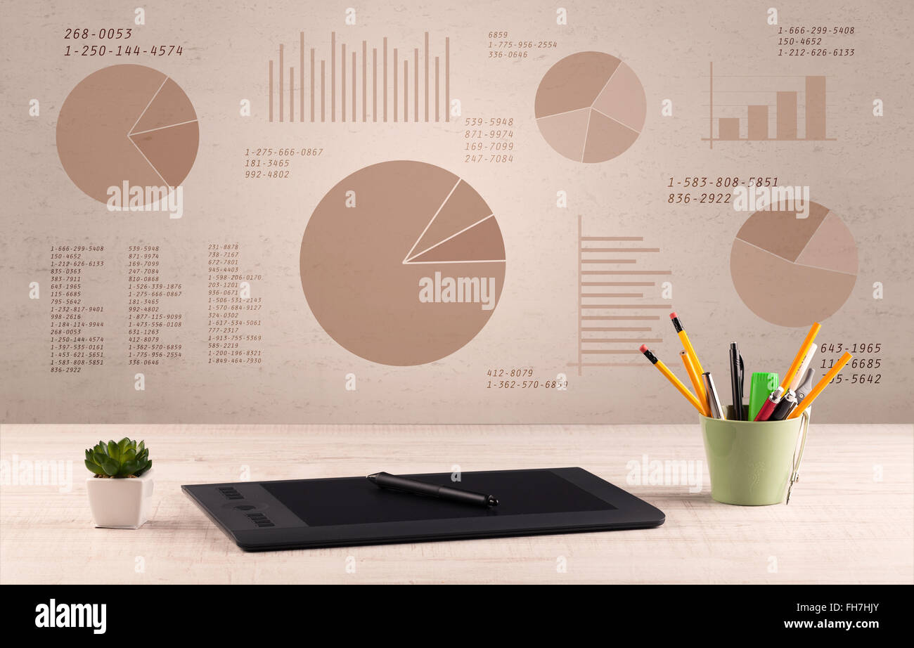 Pie chart graph office desk Stock Photo - Alamy