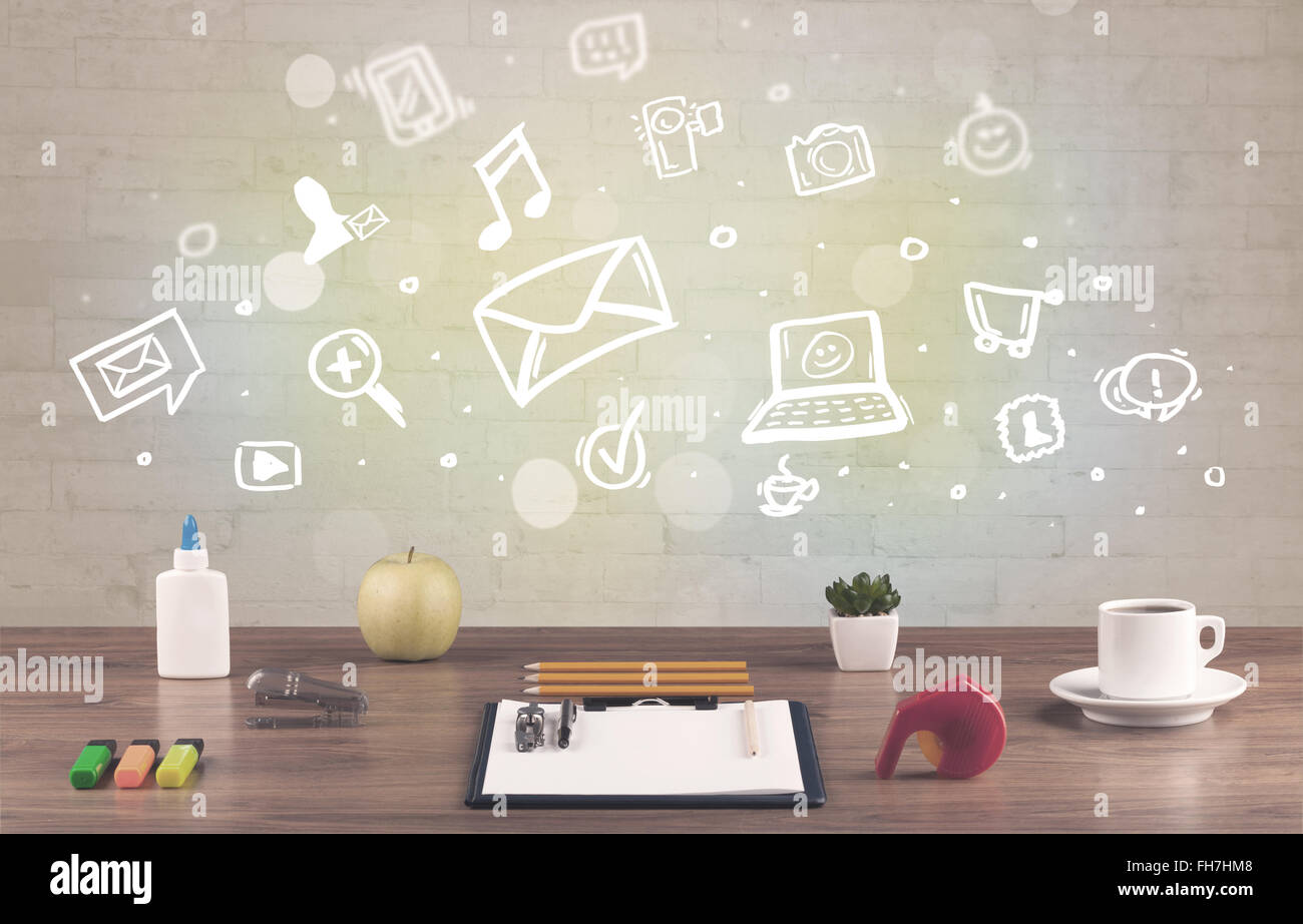 Office desk with communication icons Stock Photo - Alamy