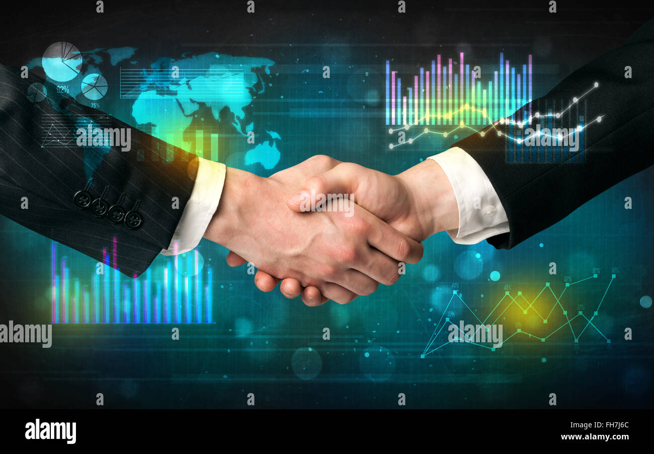 Handshake with diagrams Stock Photo - Alamy