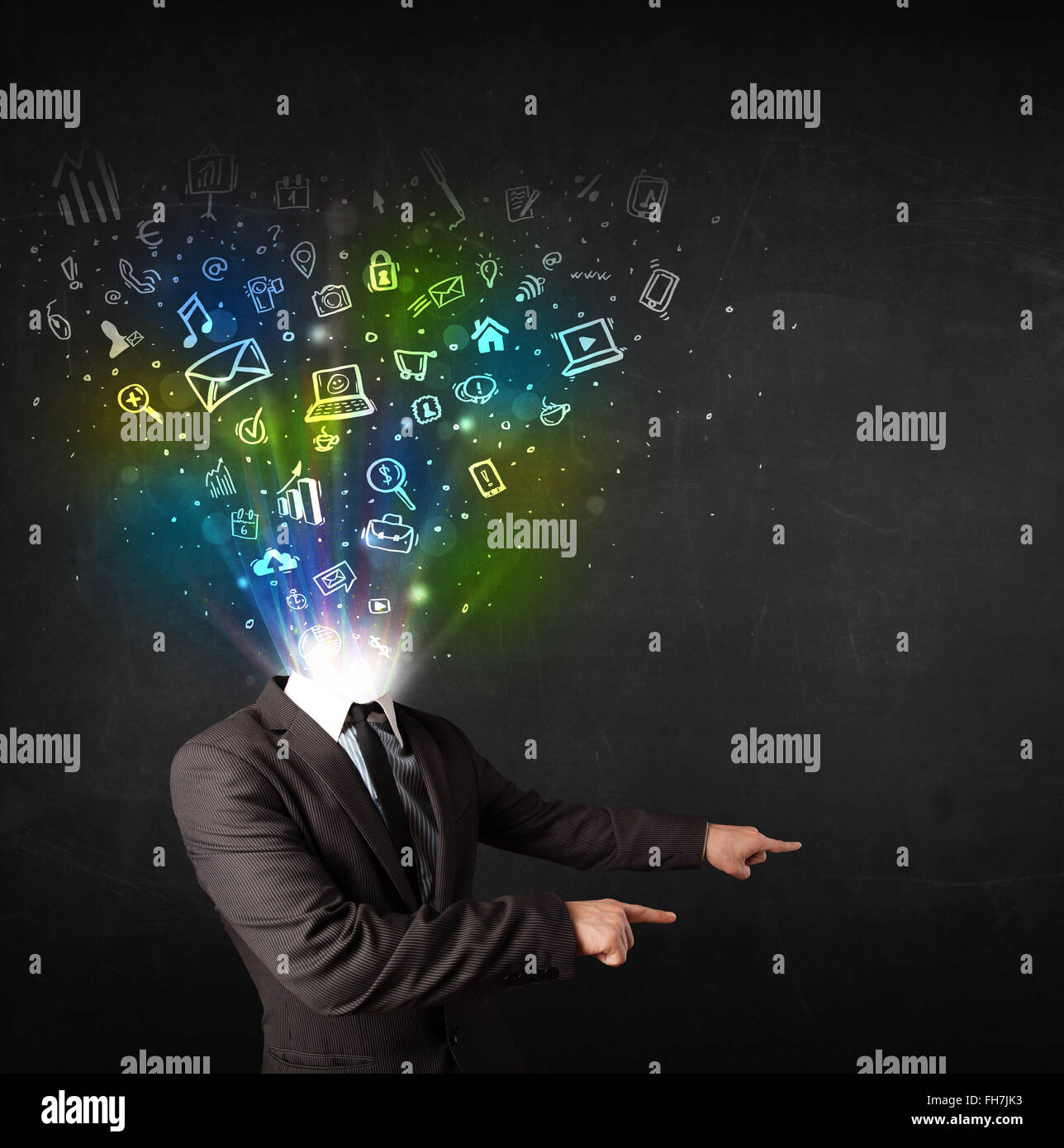 Business man with glowing media icons exploding head Stock Photo - Alamy