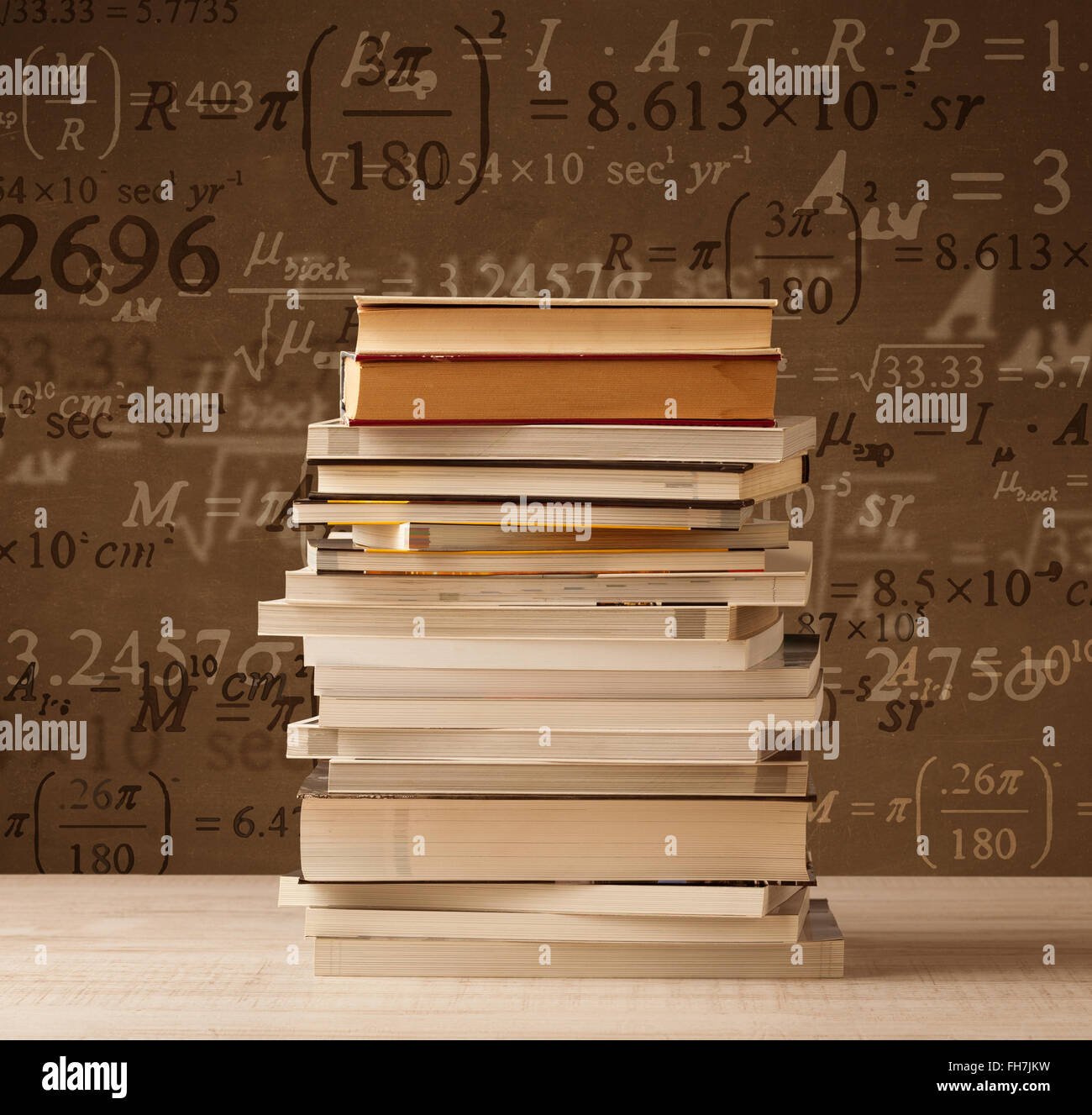Books on vintage background with math formulas Stock Photo - Alamy