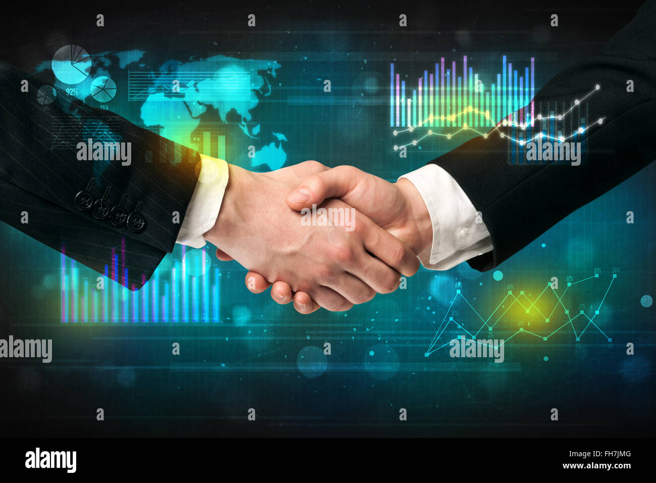 Handshake with diagrams Stock Photo - Alamy