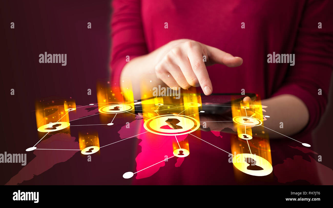 Hand holding tablet device with social network map Stock Photo - Alamy
