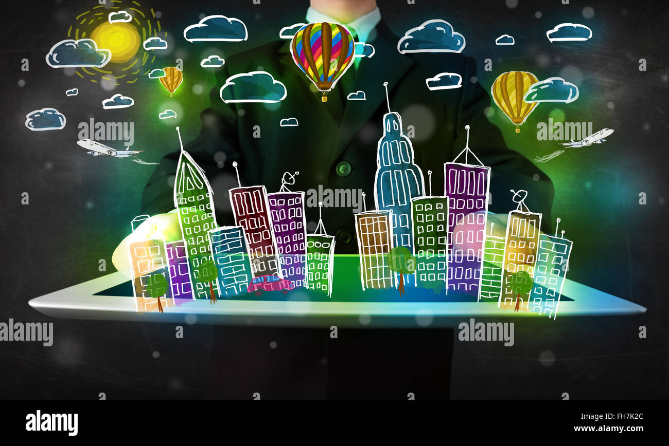 Young person showing tablet with hand drawn cityscape Stock Photo - Alamy