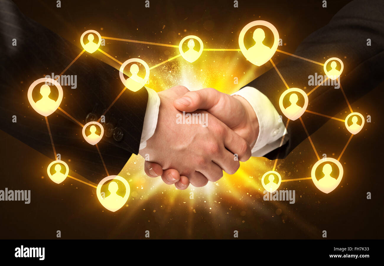 Social netwok connection handshake Stock Photo - Alamy