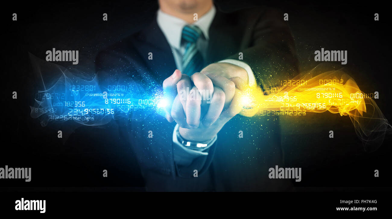 Man holding colorful glowing data in his hands Stock Photo - Alamy