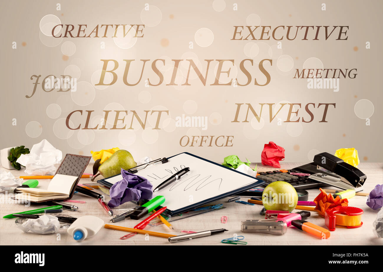 Business office desk with writing on wall Stock Photo - Alamy