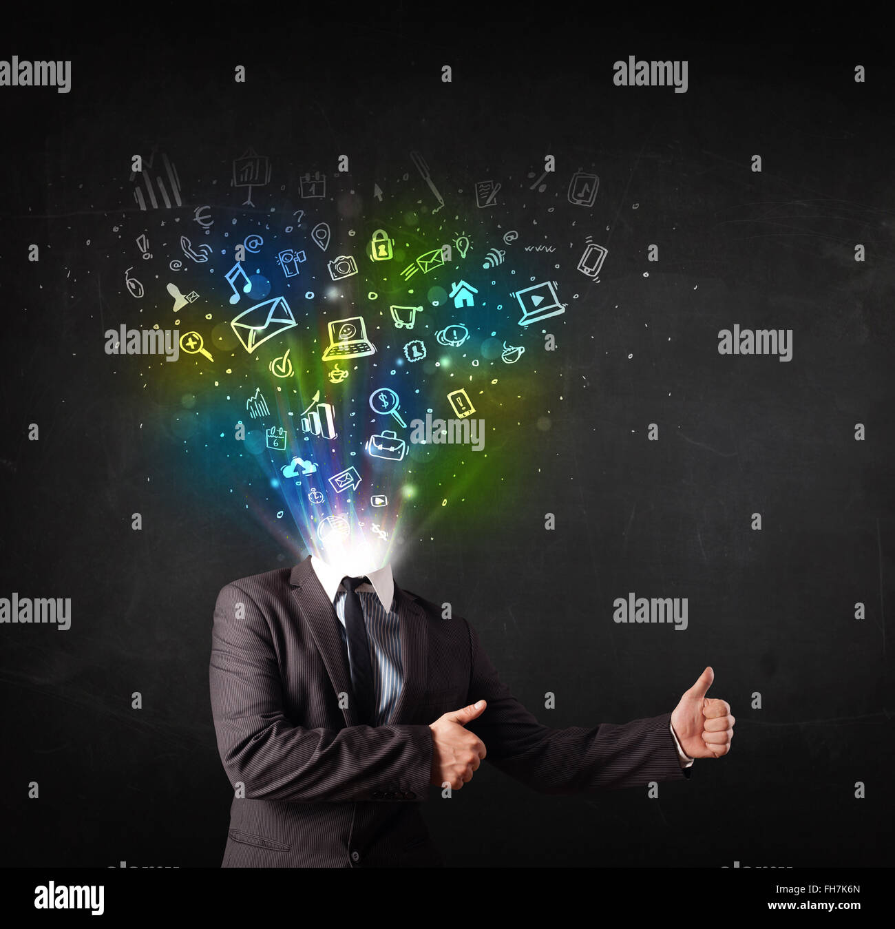 Business man with glowing media icons exploding head Stock Photo - Alamy
