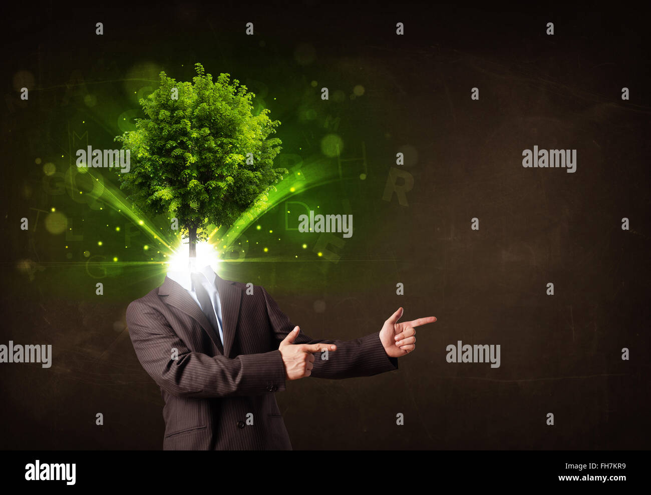 Man with green tree head concept Stock Photo - Alamy