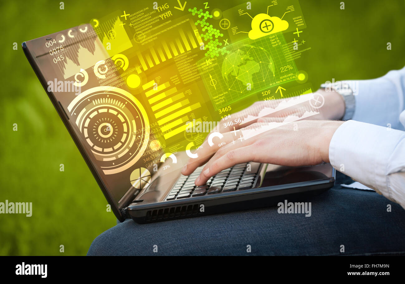 Modern notebook computer with future technology symbols Stock Photo - Alamy
