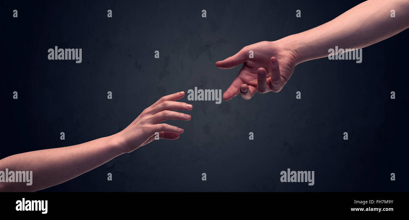 Hand about to touch another one Stock Photo - Alamy