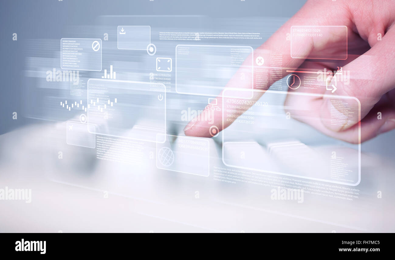 Hand touching keyboard with high tech buttons Stock Photo - Alamy