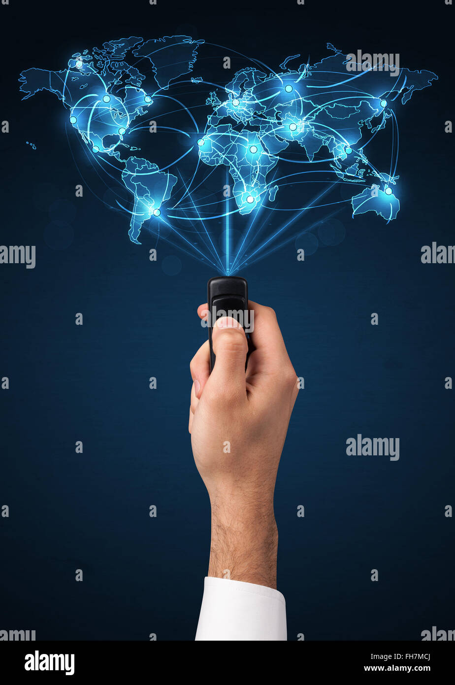 Hand with remote control, social media concept Stock Photo - Alamy