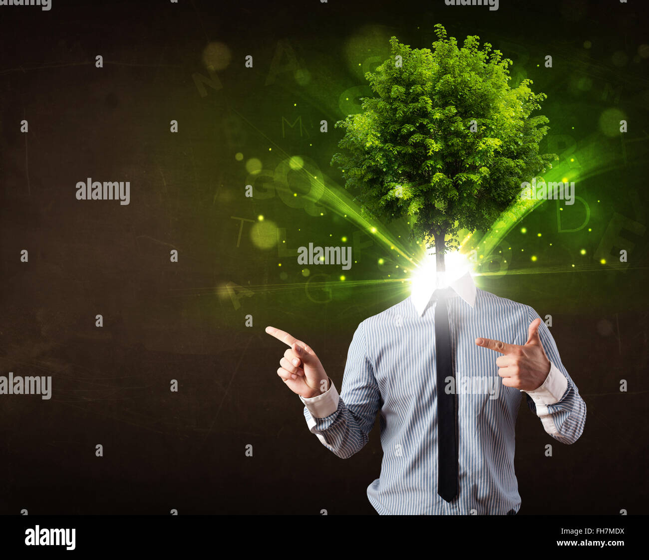 Man with green tree head concept Stock Photo - Alamy